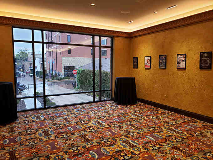 Floor-to-ceiling windows frame downtown life while that spectacular carpet steals the show beneath your feet.