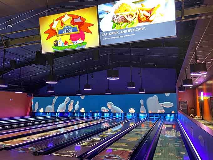 Modern bowling meets disco fever, where strikes look better under purple lights and your form matters less.