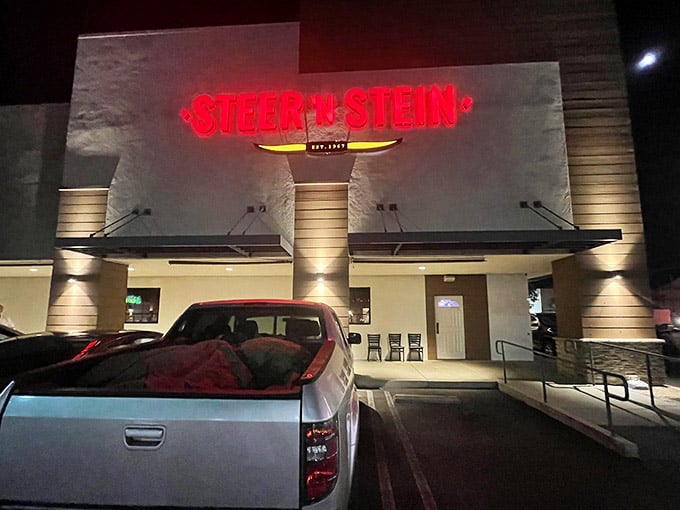 The neon glow of Steer 'n Stein beckons like a beacon for anyone who appreciates a good meal.