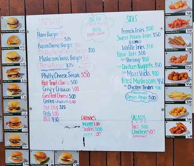 This handwritten menu proves the best food comes from places that haven't discovered lamination yet, bless them.