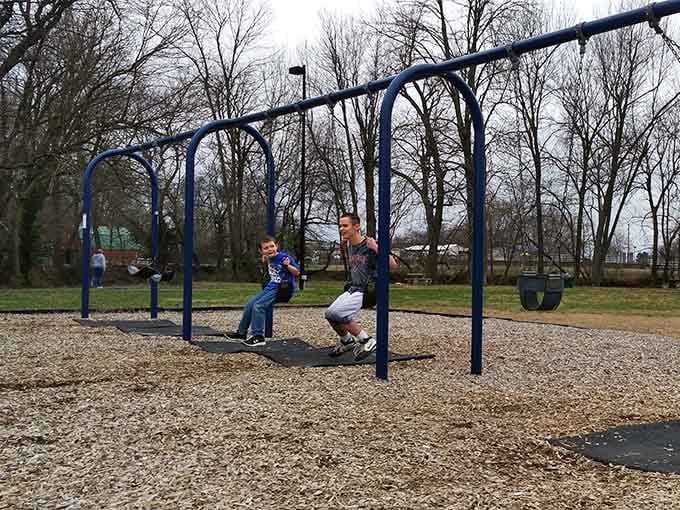 Local kids enjoying the playground where history happened, because even Lincoln's hometown knows childhood matters most.