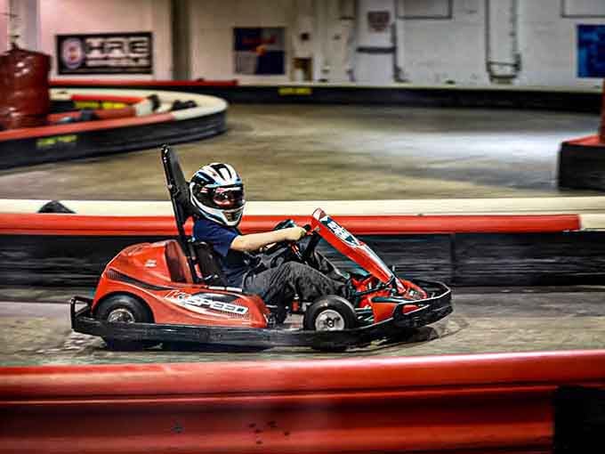 Those red barriers have witnessed more competitive family feuds than Thanksgiving dinner, and twice the adrenaline rush too.