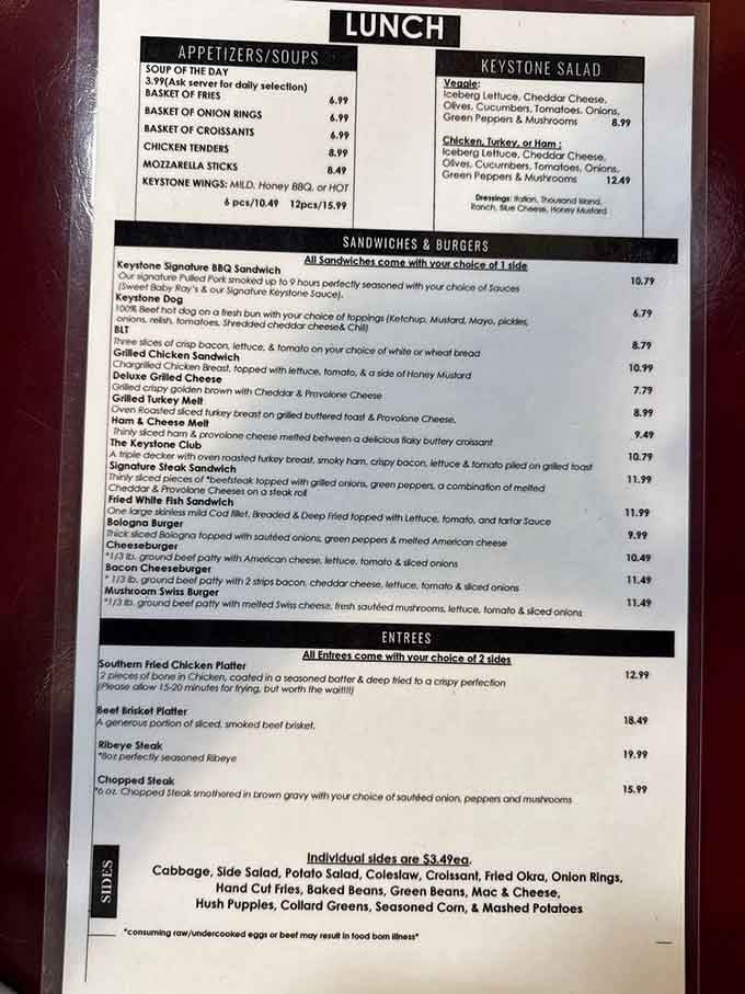 This menu reads like a love letter to comfort food, where every sandwich comes with sides and zero judgment.