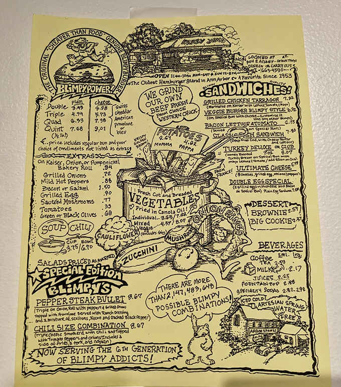 This menu on yellow paper is more iconic than most restaurant logos, proving simplicity beats pretension every single time.