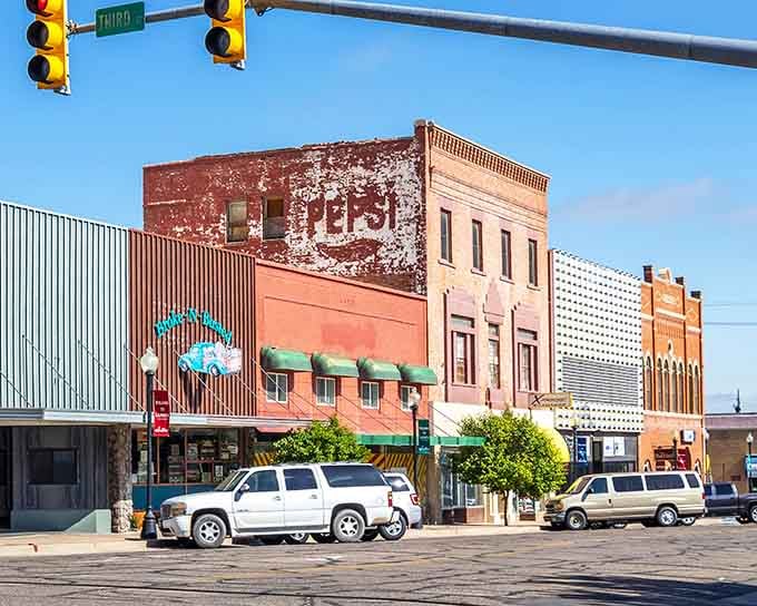 Classic brick buildings and wide streets remind you that some towns never forgot what community means.