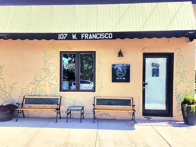 That cheerful yellow storefront promises good coffee and the kind of conversation you actually want to have.