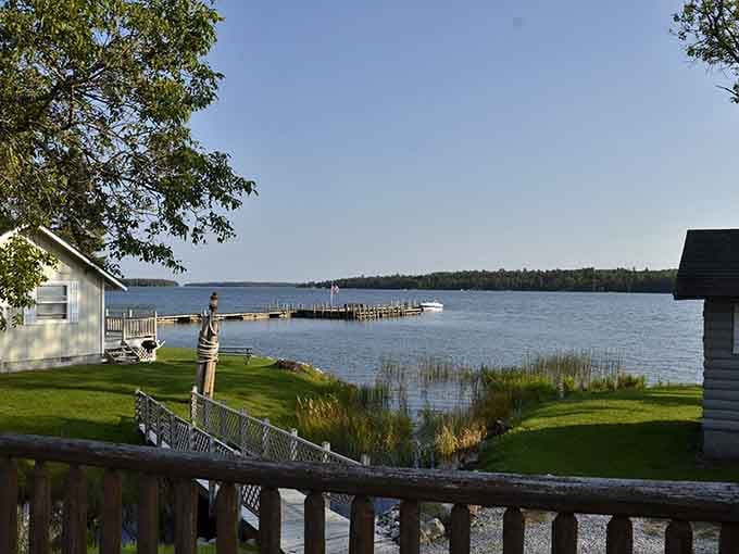 Waterfront cottages dot the shoreline, offering front-row seats to nature's daily performance on the water.