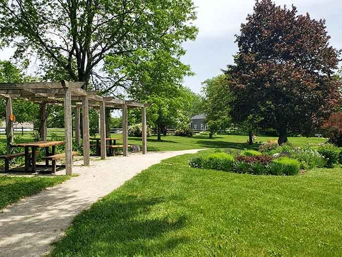 Shaded pergolas and manicured gardens invite you to sit a spell and forget your phone exists.