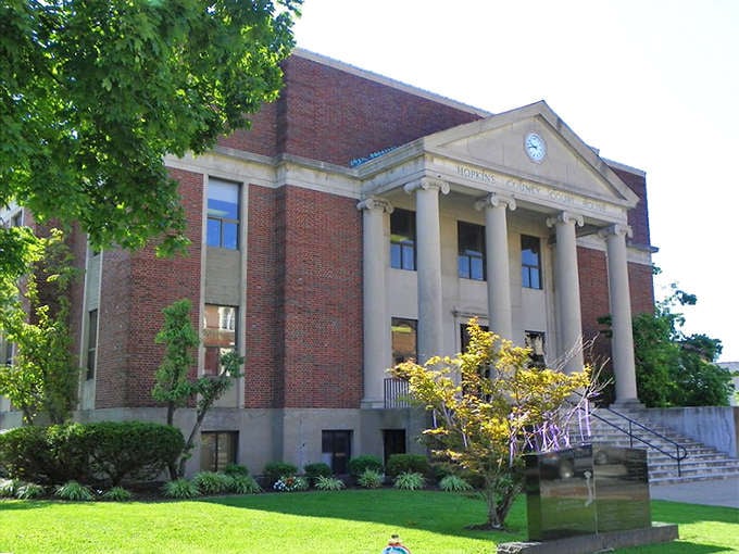 The Hopkins County Courthouse stands proud, reminding everyone that civic buildings used to be designed with actual dignity.