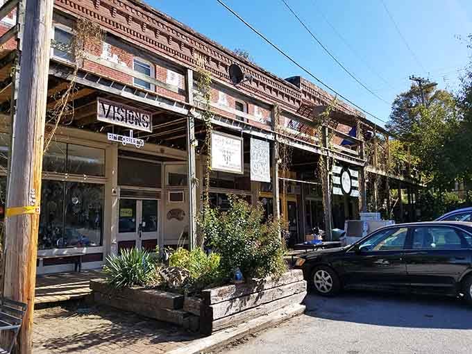 Weathered storefronts lean together like old friends sharing decades of stories, their rustic charm practically begging you to slow down and explore.
