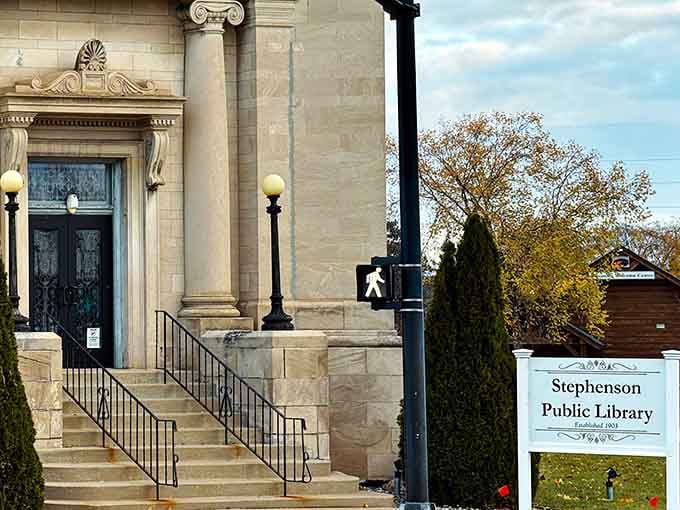 The Stephenson Public Library stands as proof that communities once built temples to knowledge instead of parking lots.