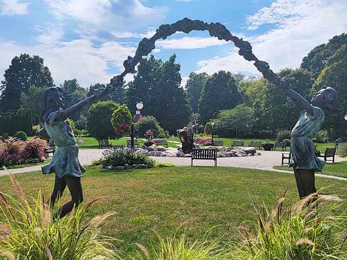 The sculptural archway at Matter Park frames a garden paradise that proves Marion takes its green spaces seriously.