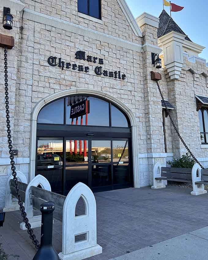 Those drawbridge-style benches flanking the entrance aren't just photo ops, they're thrones for cheese royalty.