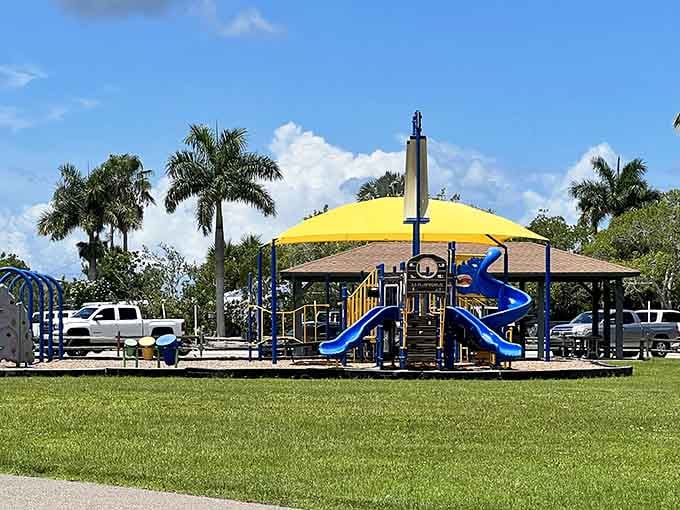 That cheerful yellow canopy promises shade and fun, because even playgrounds deserve to look happy here.