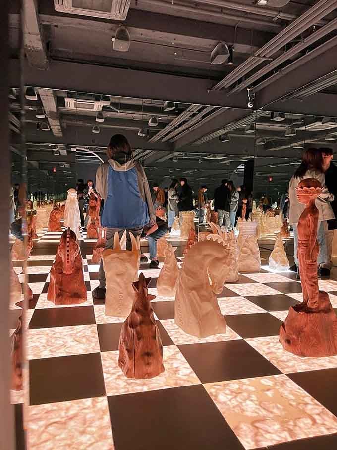 That giant chess game where you're simultaneously the player and the piece? Yeah, it's wild.