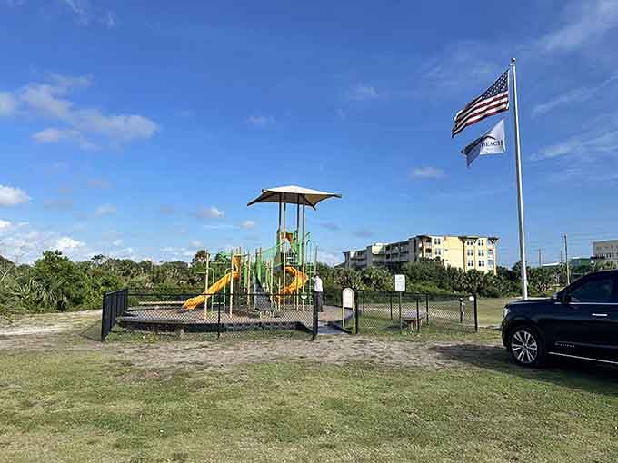 Stars and stripes flying over a playground where kids can actually be kids without the tourist circus.