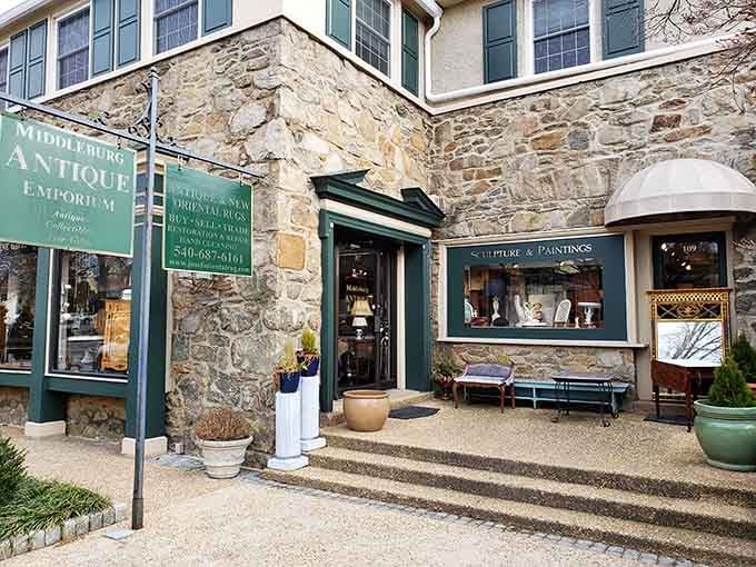 The Middleburg Antique Emporium beckons from its stone facade, promising treasures that your credit card didn't know it needed today.
