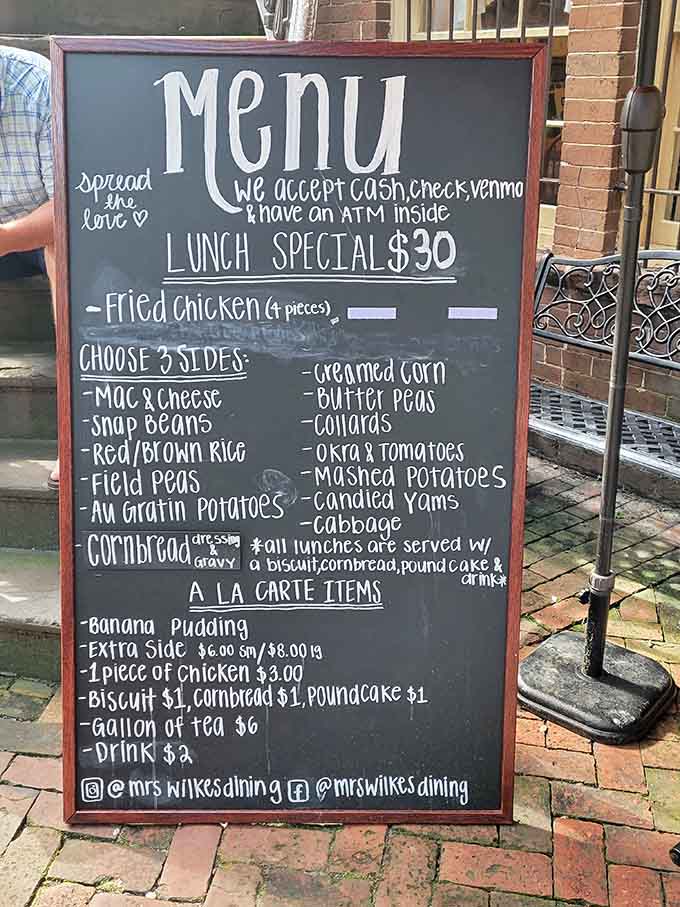 The chalkboard menu keeps it refreshingly simple: fried chicken, three sides, and the promise of leaving gloriously stuffed.
