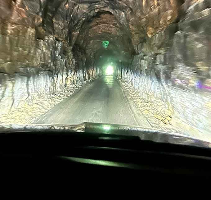 Your headlights become your best friend real quick when you're navigating 900 feet of hand-carved mountain passage.