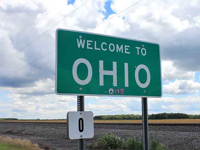 Nothing says "you made it" quite like spotting that welcome sign against a backdrop of genuine Midwestern clouds and sky.