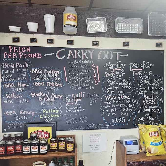 That chalkboard menu is your roadmap to happiness, written in the universal language of smoked meat perfection.