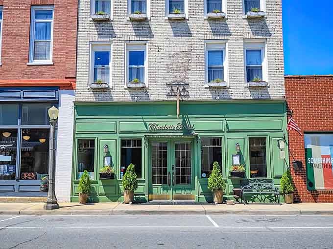 The Charlotte's mint-green facade practically begs you to slow down and stay awhile, doesn't it?