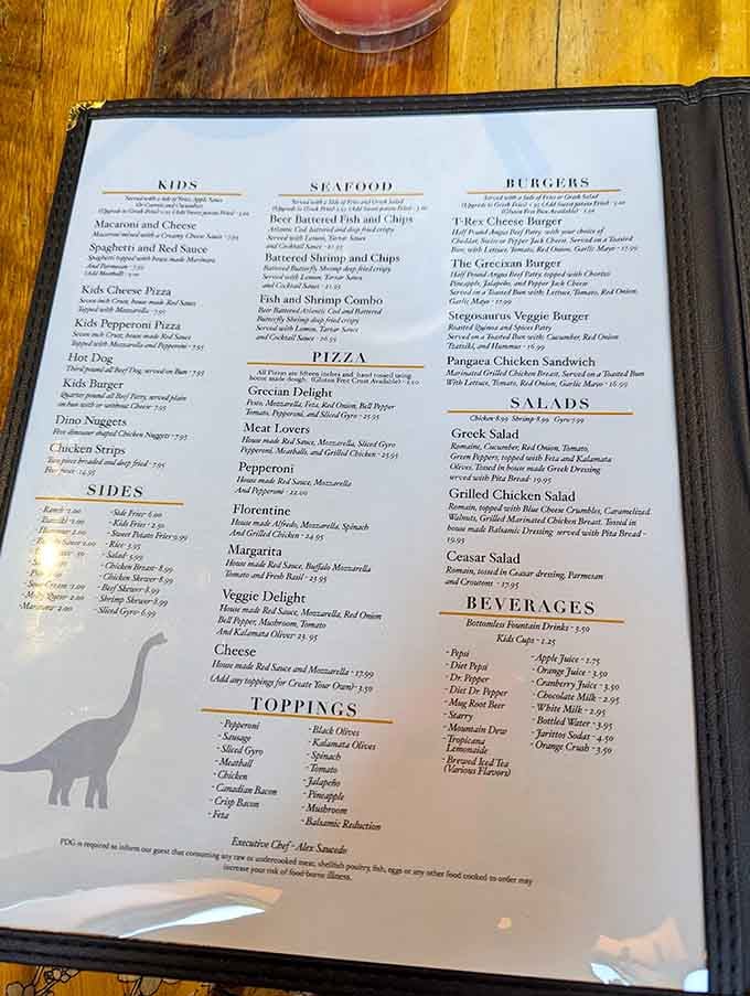 Even the menu gets the prehistoric treatment, because why should the walls have all the fun?