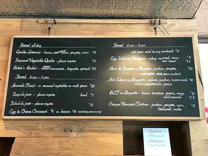 This menu board proves that sometimes the best decisions in life involve bacon, gruyere, and zero regrets.