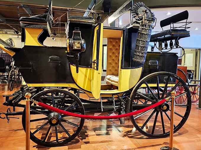 This stunning yellow carriage proves our ancestors knew how to travel in style, even without cup holders.