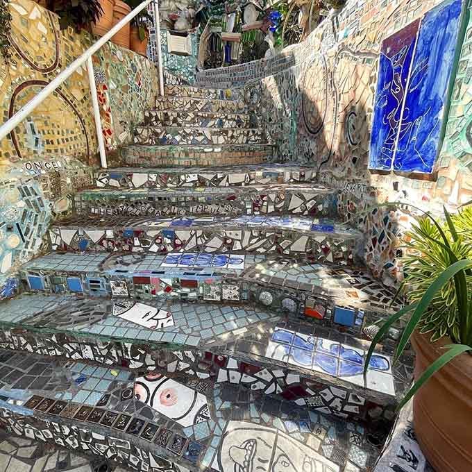 These mosaic stairs prove that even functional architecture can sparkle, making every step feel like climbing through a kaleidoscope.