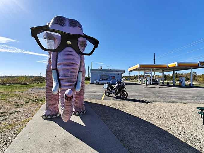 Your gas station stop just got infinitely more interesting with this towering pink neighbor watching over you.
