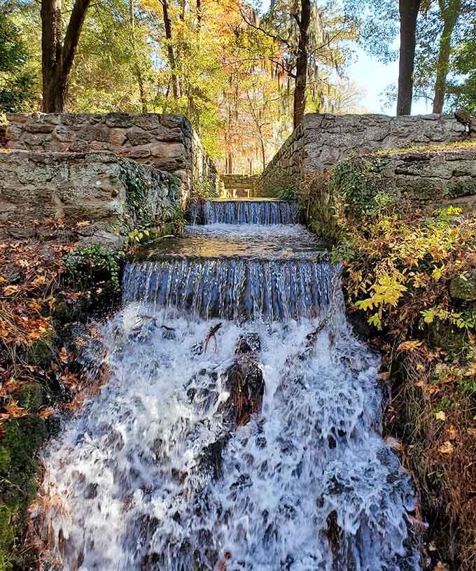 The spillway cascading down like South Carolina's answer to a mountain waterfall, minus the altitude and tourist buses.
