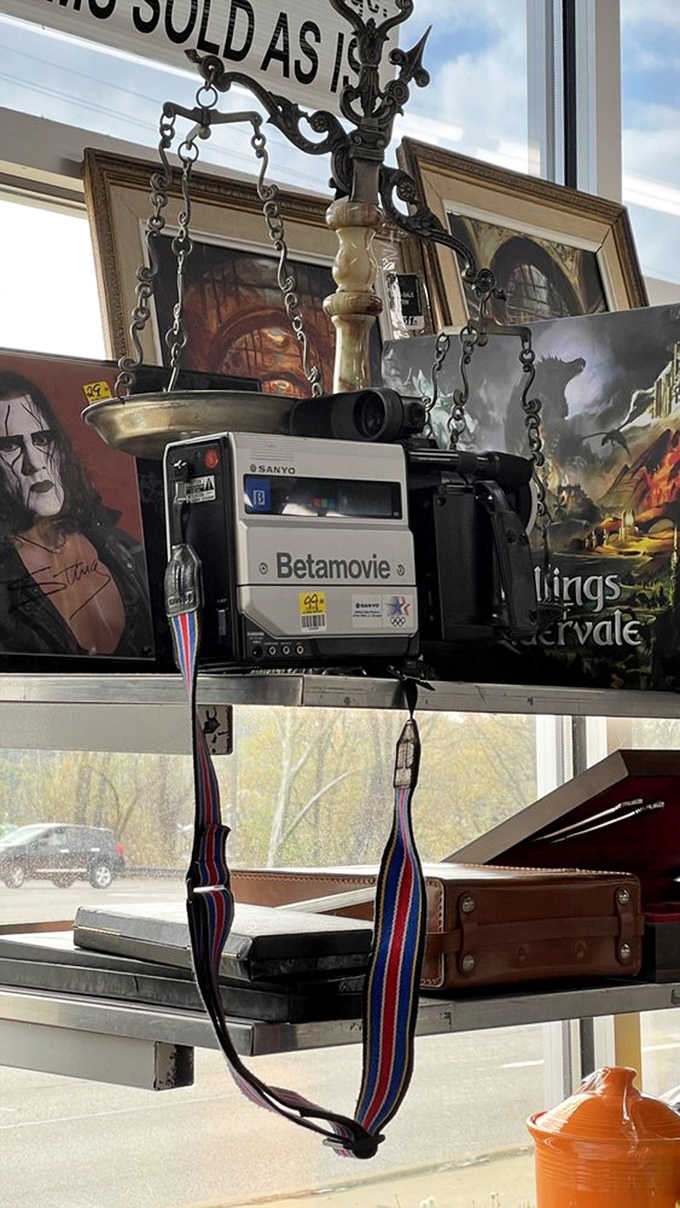 A Betamovie camcorder sits among treasures, reminding us that one person's obsolete technology is another's vintage gold.