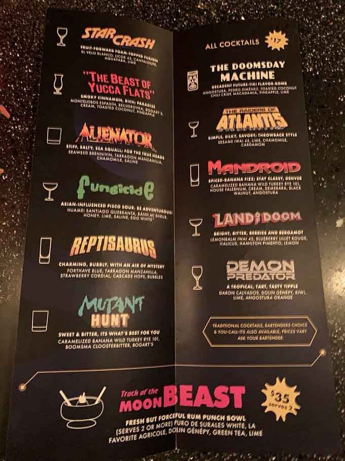 A menu where B-movie monsters meet craft cocktails, because why shouldn't your drink be named Reptisaurus?