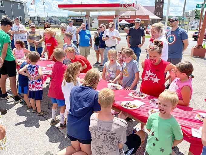 Community gatherings around bright red tables prove the best celebrations don't need fancy venues or expensive tickets.