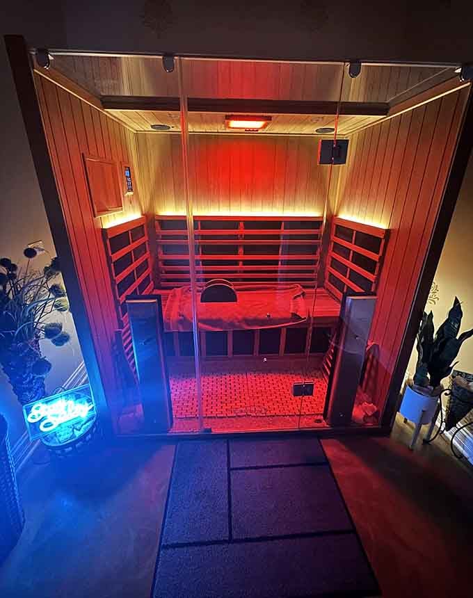 Step into Royal Salt Cave & Spa's infrared sauna where the red glow promises detox without the drama of traditional steam rooms.