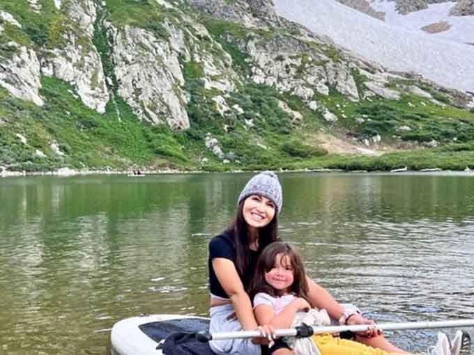 Nothing says "living your best life" quite like paddleboarding on an alpine lake surrounded by snow-capped peaks.