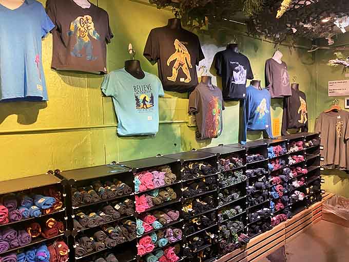 Yellow walls lined with Bigfoot tees in every color imaginable, because one cryptid shirt is never enough.