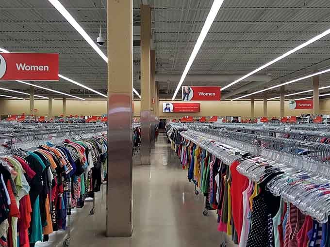 Aisles stretch endlessly like a fashionista's fever dream, organized by color for your browsing pleasure.