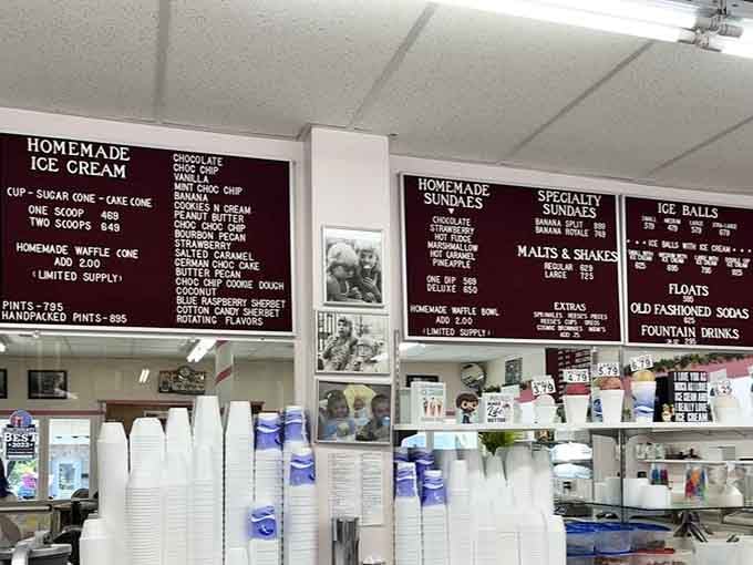 Hand-painted menu boards tell the sweet story: this is where ice cream dreams and candy fantasies collide.