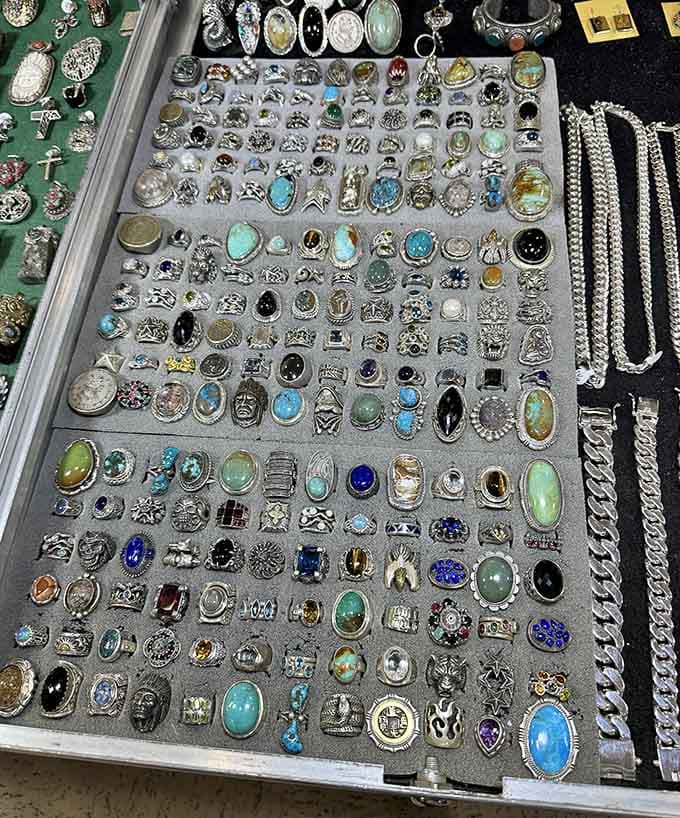 Rows of vintage rings that have adorned fingers through decades of handshakes, proposals, and "I really shouldn't buy another one."