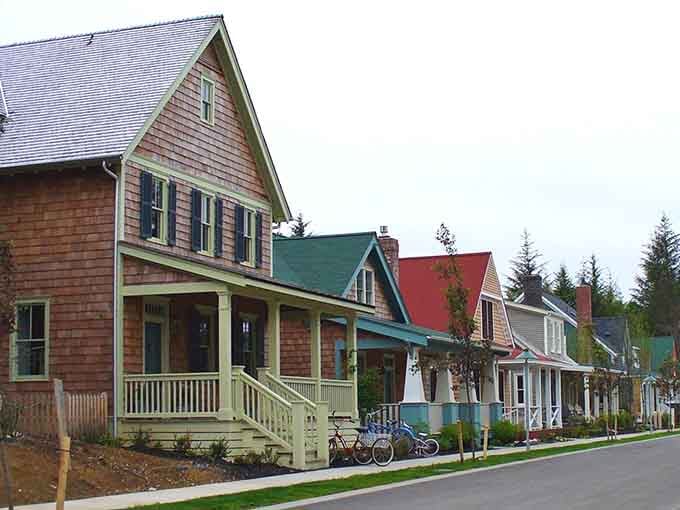 Each house tells its own story through color, like a neighborhood that raided the best paint store ever.