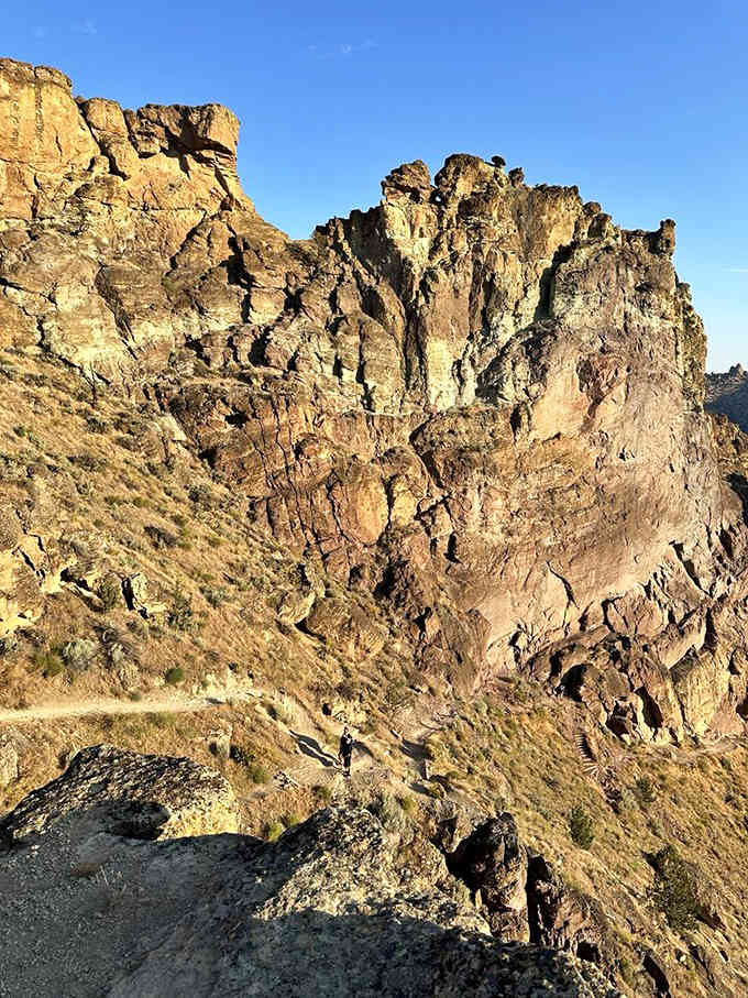 These rust-colored rock faces glow like they're lit from within, making every amateur photographer feel like Ansel Adams.