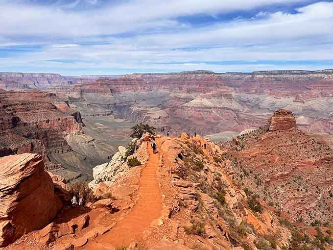 Walking this narrow spine feels like balancing on the edge of time itself, with infinity stretching in every direction.
