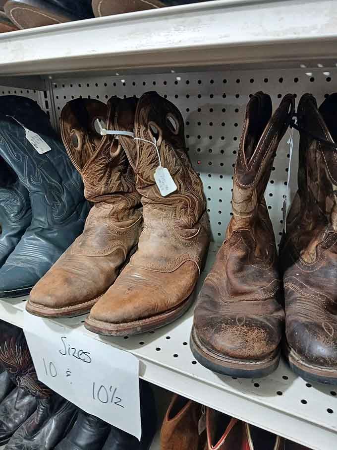 These weathered cowboy boots have walked more miles than your car's odometer, now waiting for their next journey.
