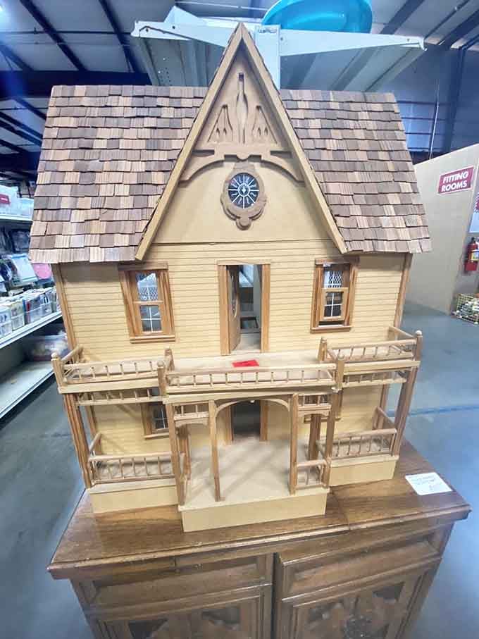 This elaborate dollhouse is someone's childhood dream waiting to become part of your family's story now.