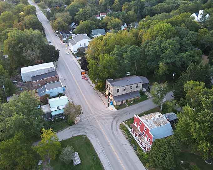 From above, this riverside village looks like a toy train set, complete with one perfect street and endless charm.