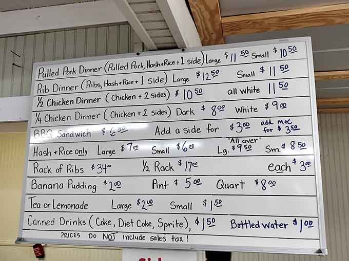 That handwritten menu board tells you everything: simple choices, serious food, and banana pudding by the quart if you're smart.