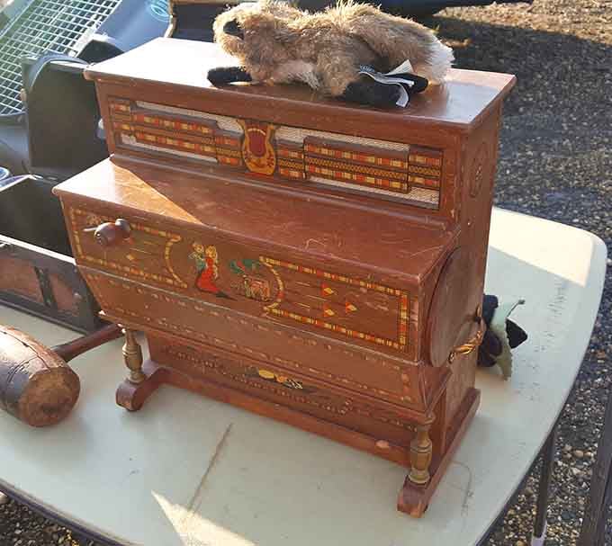 This ornate wooden piece proves that one person's attic mystery is another person's perfect conversation starter.