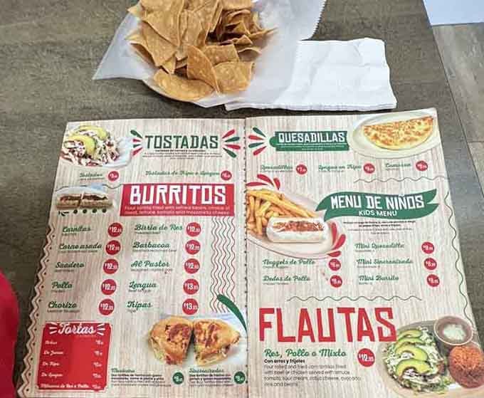 When the menu arrives with fresh chips, you know you're in for something special beyond typical roadside fare.